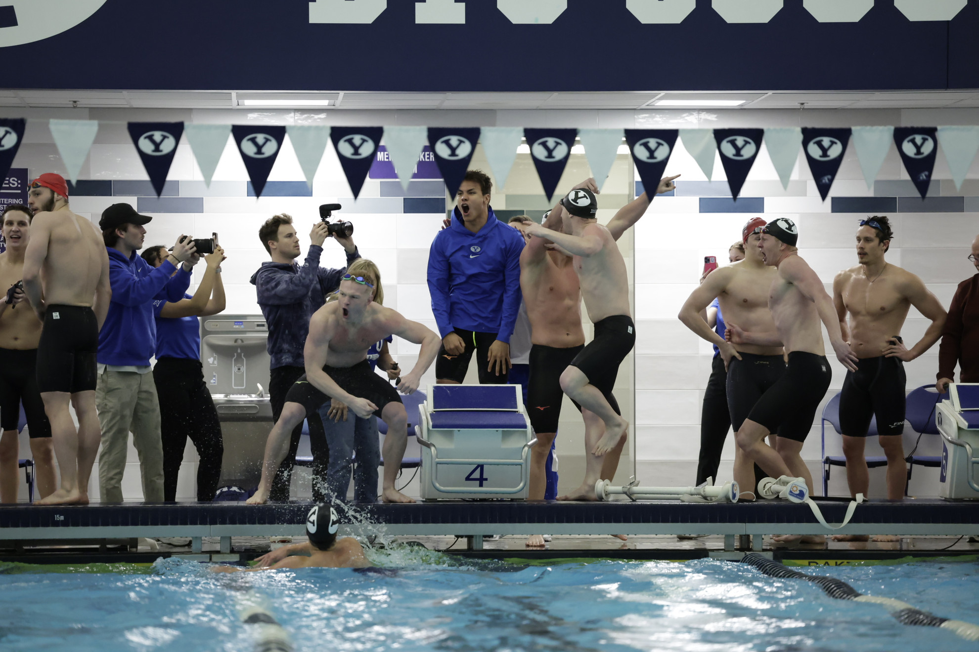 Men’s swim downs four pool records, leads Utah heading into Saturday ...